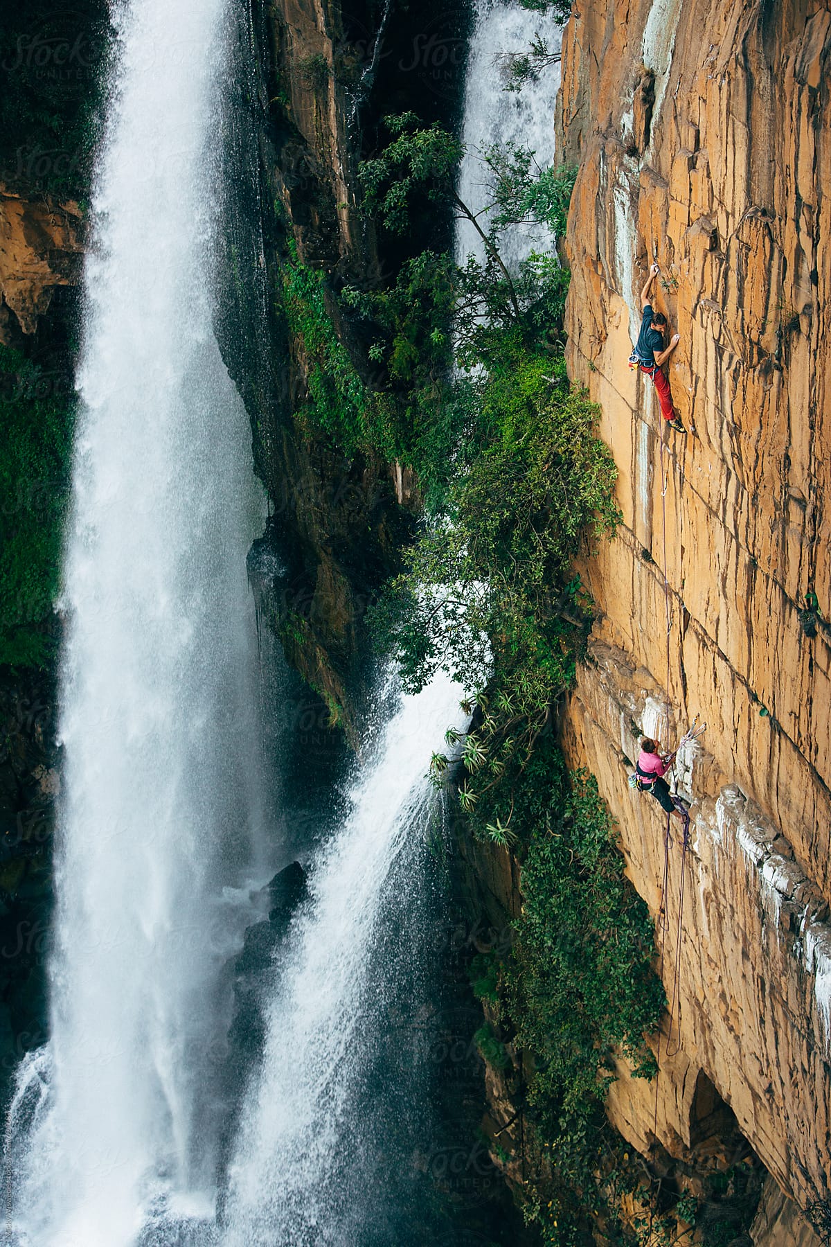 "Mountain Climbing Next To A Waterfall" by Stocksy Contributor "Juno ...