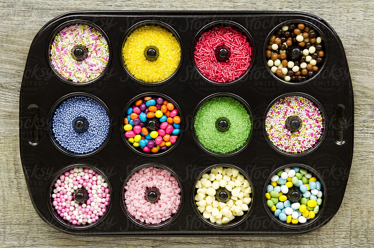 "Doughnut Pan Filled With Sprinkles" by Stocksy Contributor "Kirsty ...