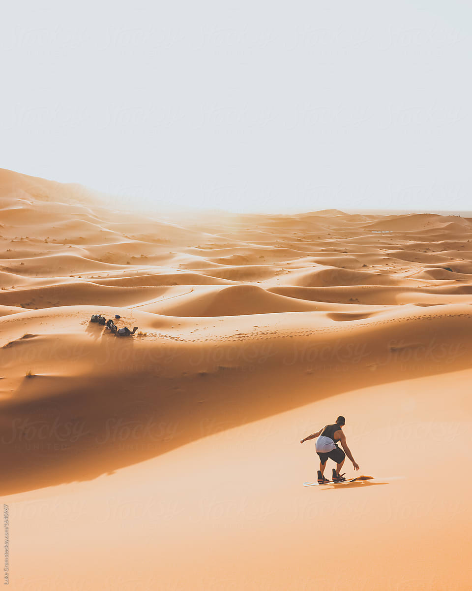 "Sandboarding In The Sahara Desert" by Stocksy Contributor "Luke Gram ...