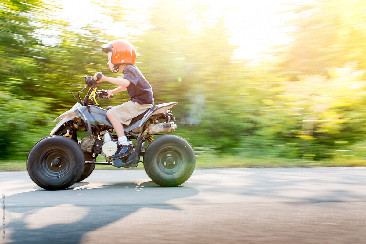 "Boy Riding Fast Gas Powered Jr Kids ATV Quad" by Stocksy Contributor ...