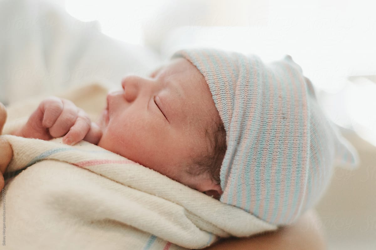 "Baby Girl Is Born" by Stocksy Contributor "Sidney Scheinberg" - Stocksy