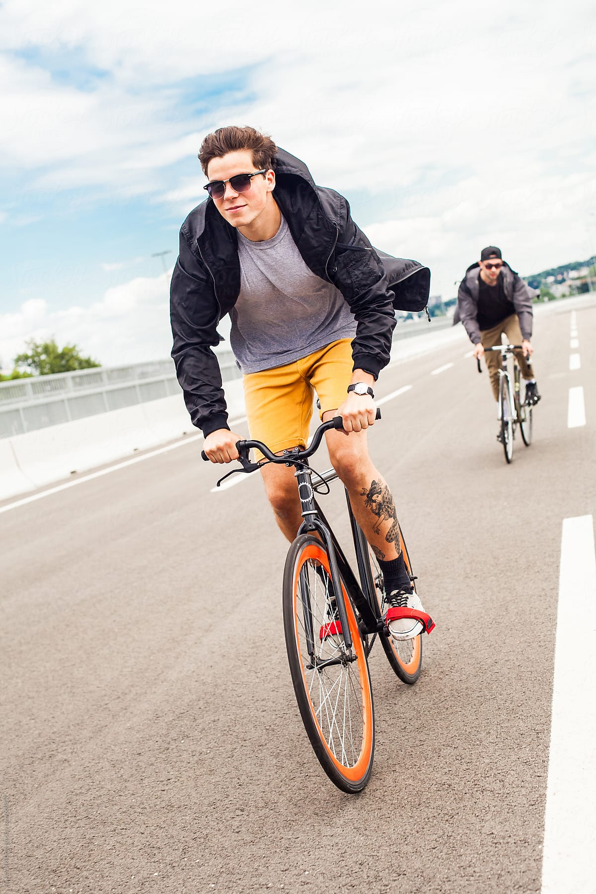 "2 Urban Fixed Gear Bike Cyclist Racing On City Streets." by Stocksy ...