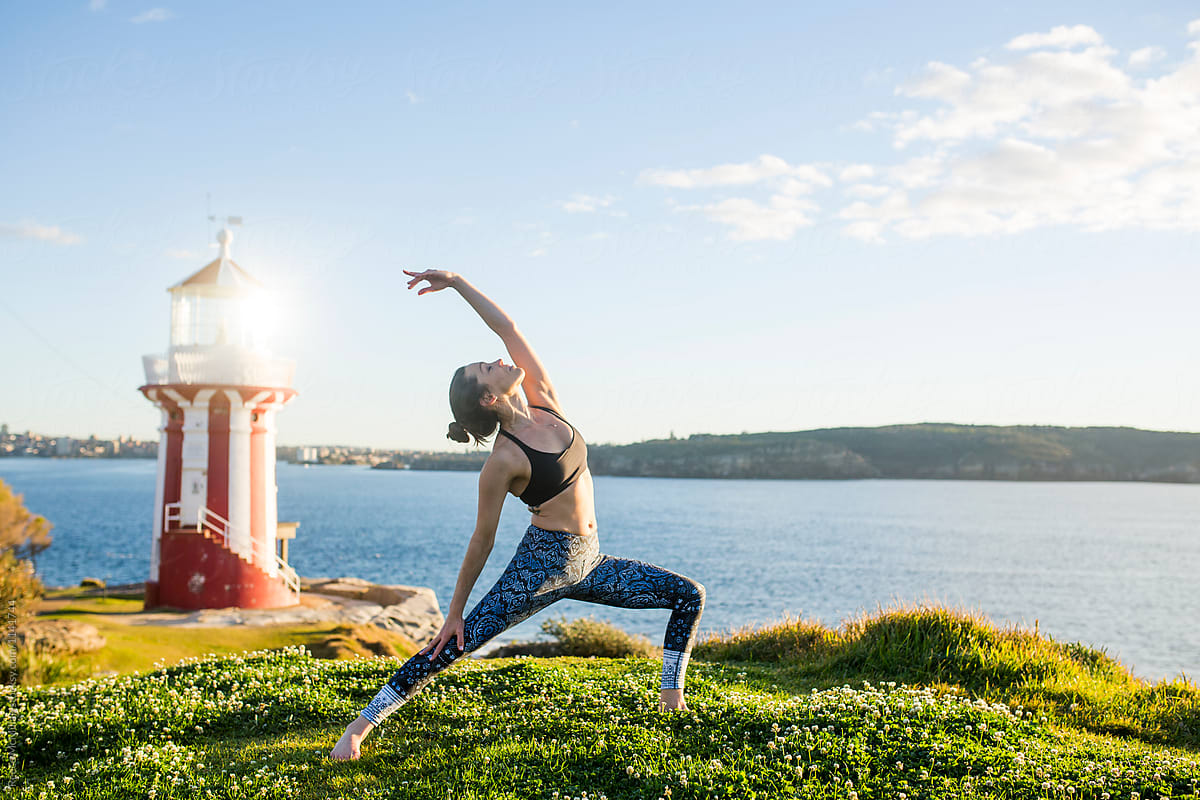 "A Female Yogi Practicing At Sunrise" by Stocksy Contributor "Reece ...