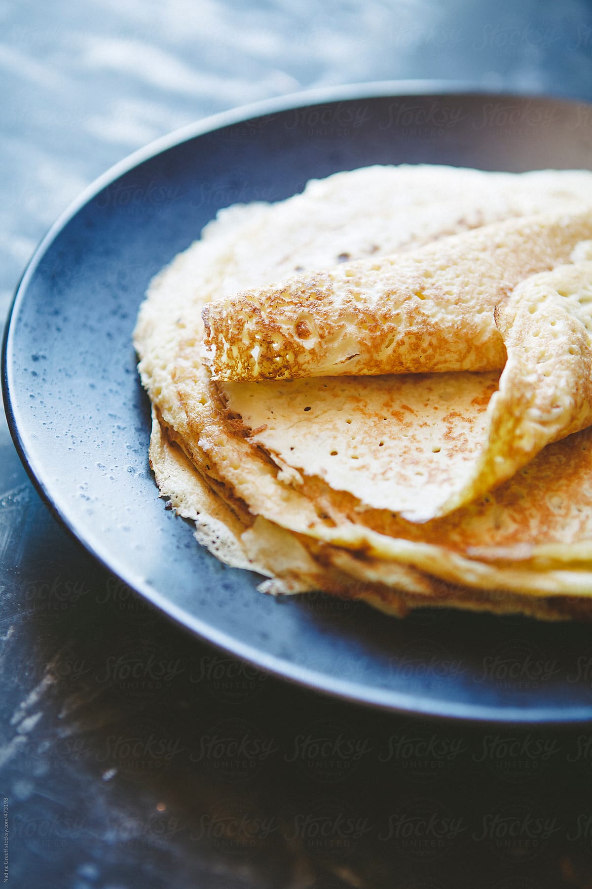 "Crepes Or Thin Pancakes" by Stocksy Contributor "Nadine Greeff" - Stocksy