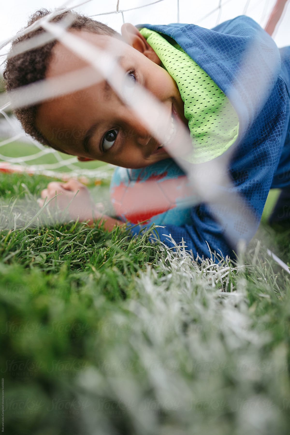 "Little Boy Having Fun Learning Soccer Skills Outside" by Stocksy ...