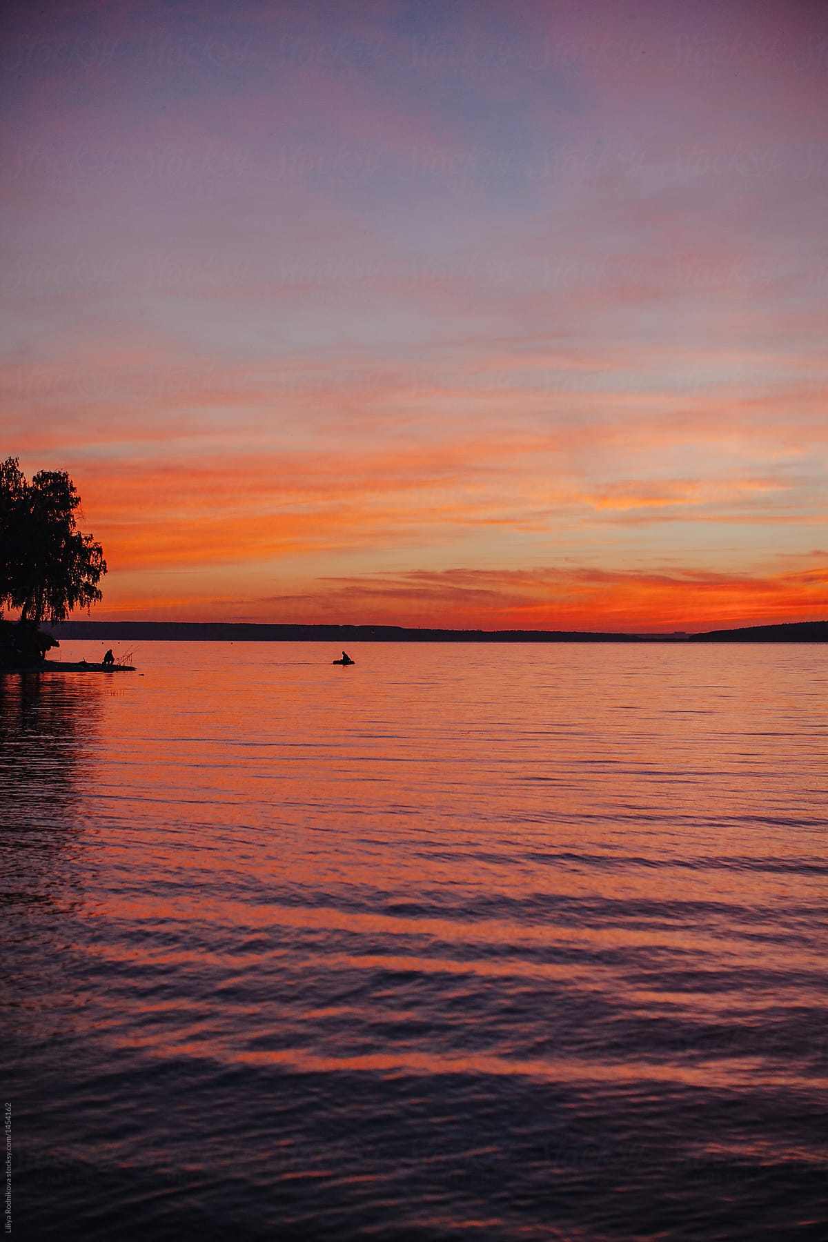 "Orange Beautiful Sunset Over The River" by Stocksy Contributor "Liliya ...
