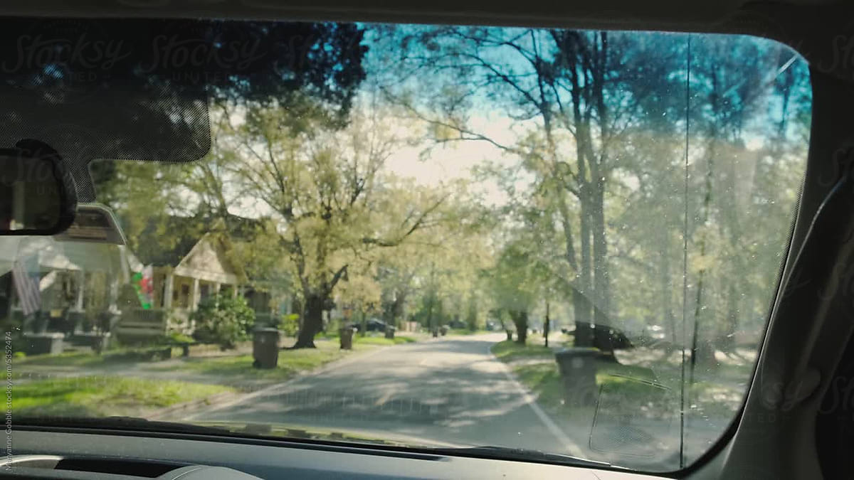 "Driving In Residential Neighborhood" by Stocksy Contributor "Maryanne ...