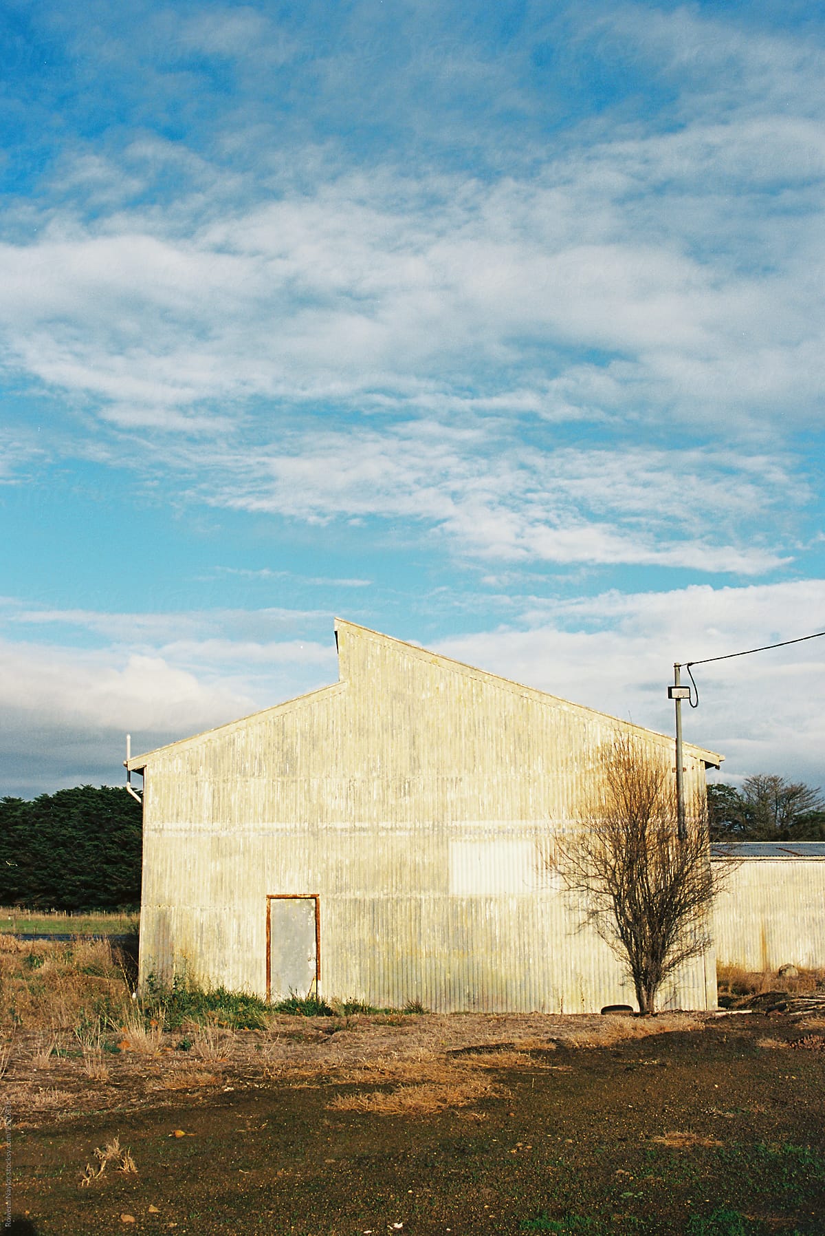 "Rustic Old Farm Shed" by Stocksy Contributor "Rowena Naylor" - Stocksy