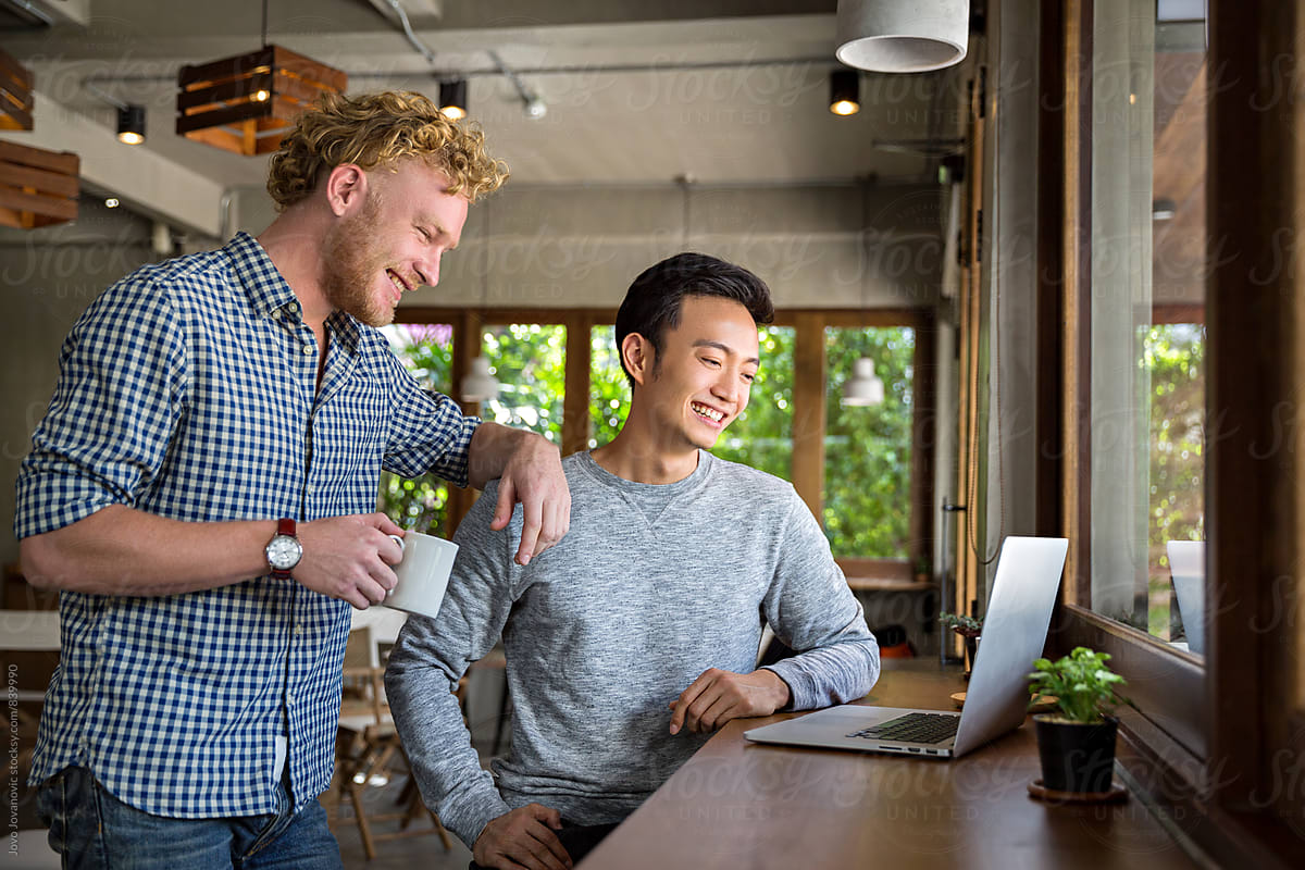 "Two Young Entrepreneurs Working Together On A Computer" by Stocksy ...