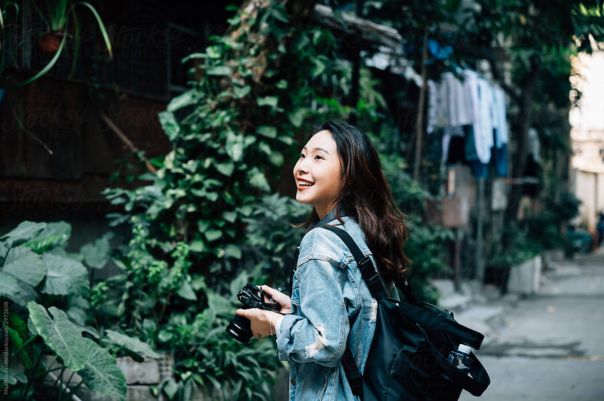 "Young Woman Using Camera Outdoors" by Stocksy Contributor "MaaHoo ...