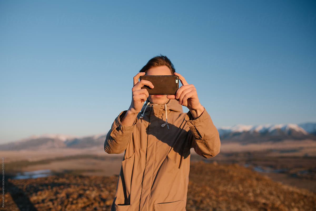 "Male Taking Photo Of Landscape" by Stocksy Contributor "Alexandr ...