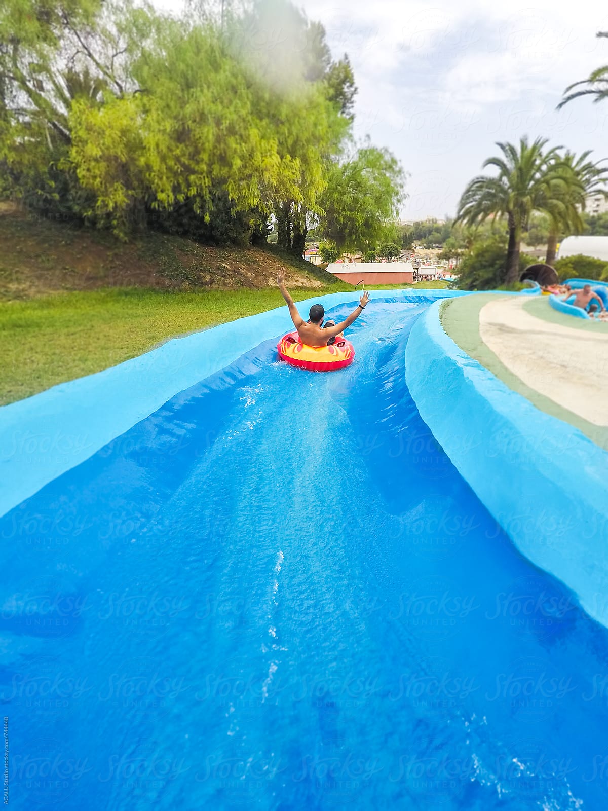 "Man With An Inflatable Mattress On A Waterpark" by Stocksy Contributor ...