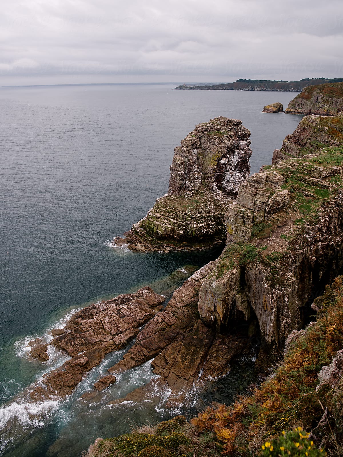 "Rocky Cliffs And Rough Sea Below" by Stocksy Contributor "Alexandr ...