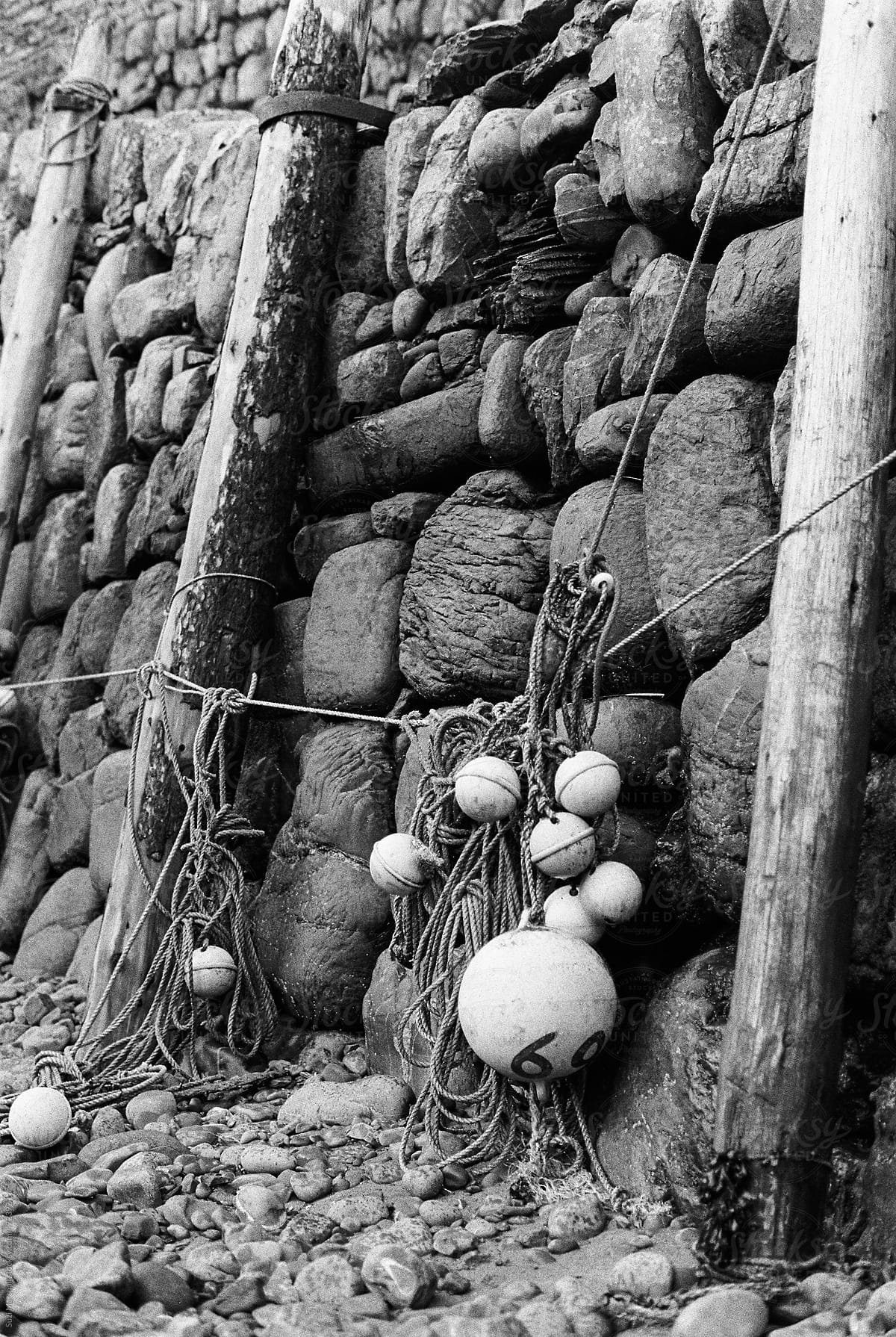 "Buoys Hanging On A Seawall" by Stocksy Contributor "Suzi Marshall ...