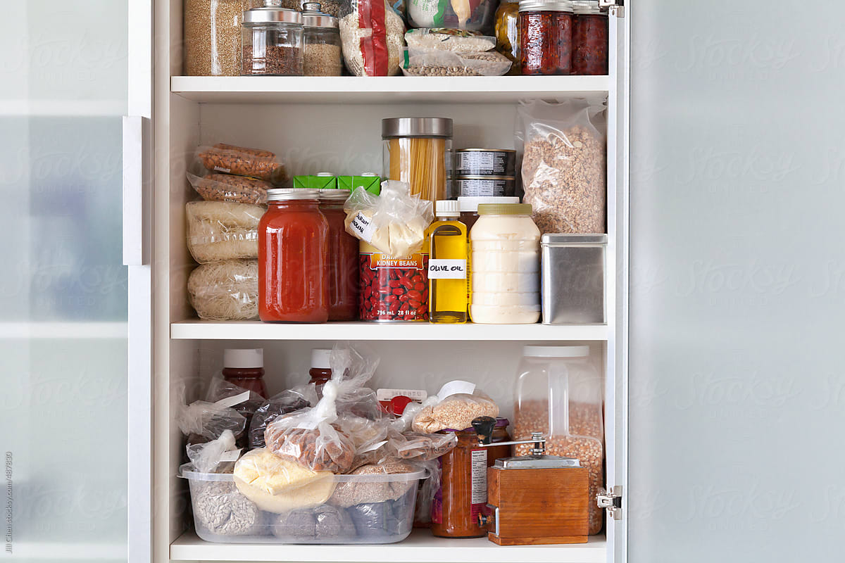 "Stocked Kitchen Pantry" by Stocksy Contributor "Jill Chen" - Stocksy