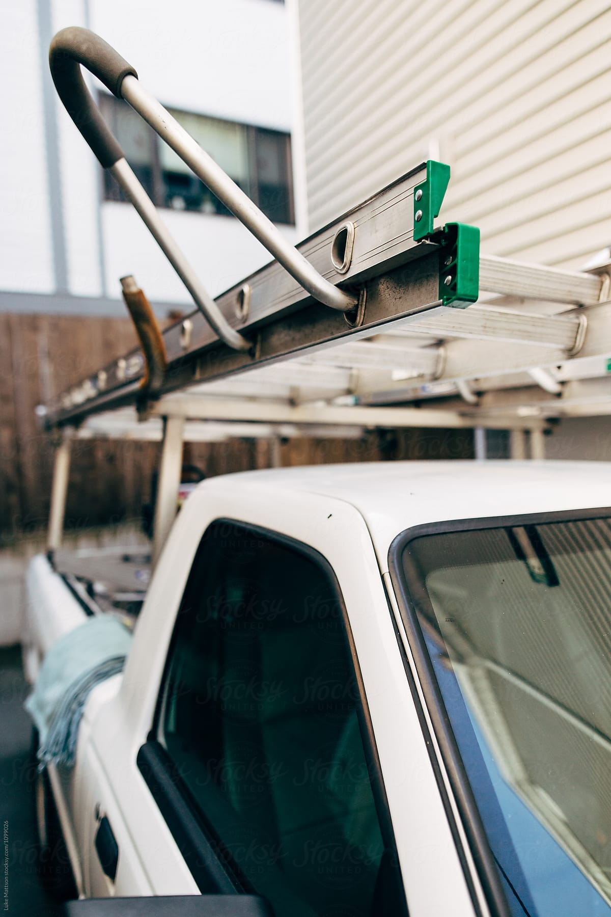 "Ladder Mounted On Top Of Work Truck" by Stocksy Contributor "Luke ...