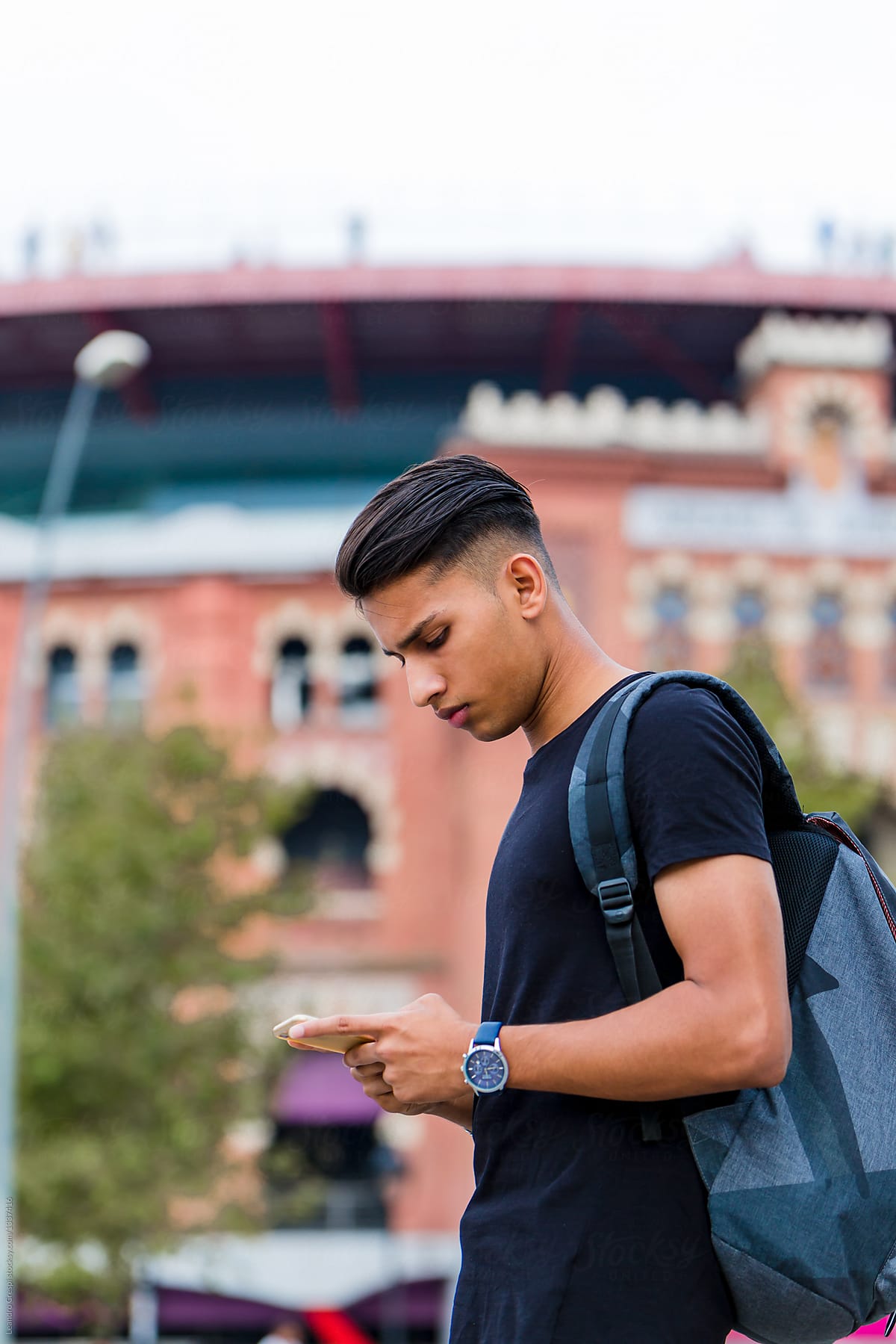 "Man Searching Location In A Map App" by Stocksy Contributor "Leandro ...