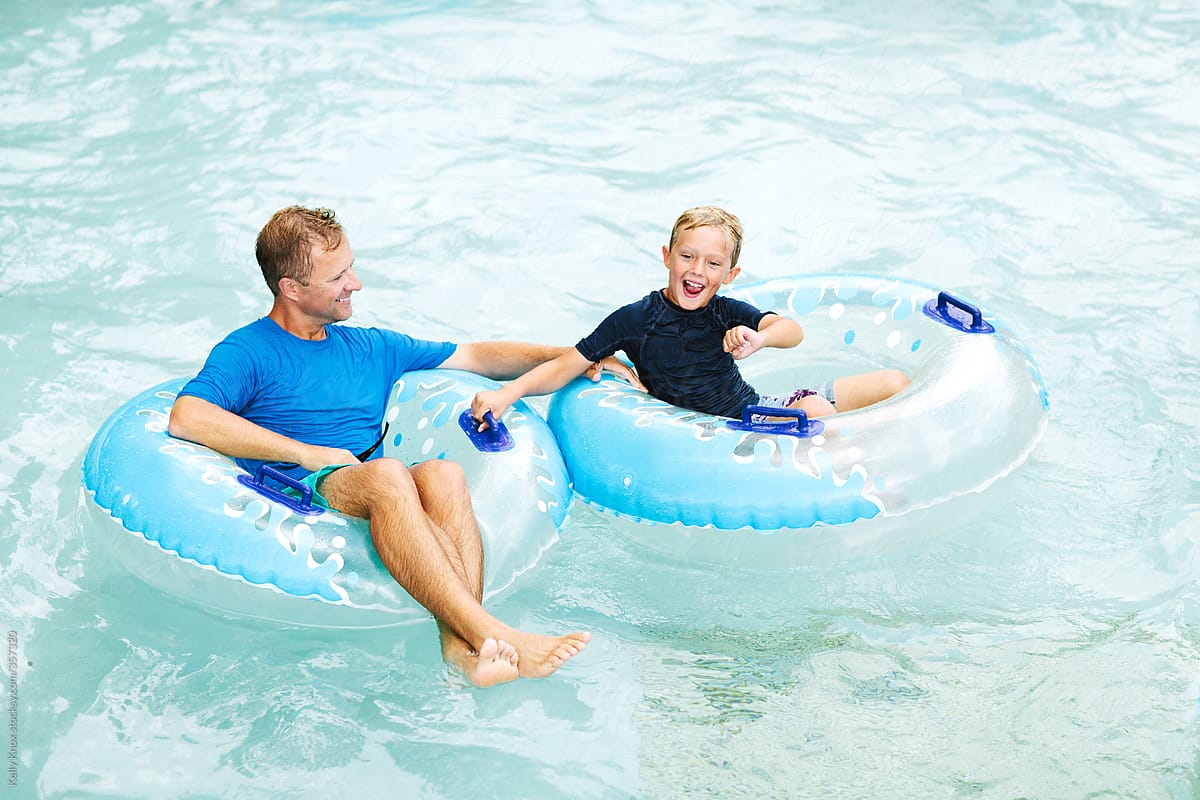 "Father And Son Playing In A Pool" by Stocksy Contributor "Kelly Knox ...