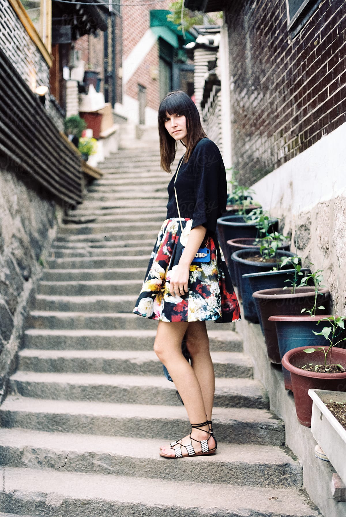 "Portrait Of A Woman Walking Up The Stairs" by Stocksy Contributor "A ...