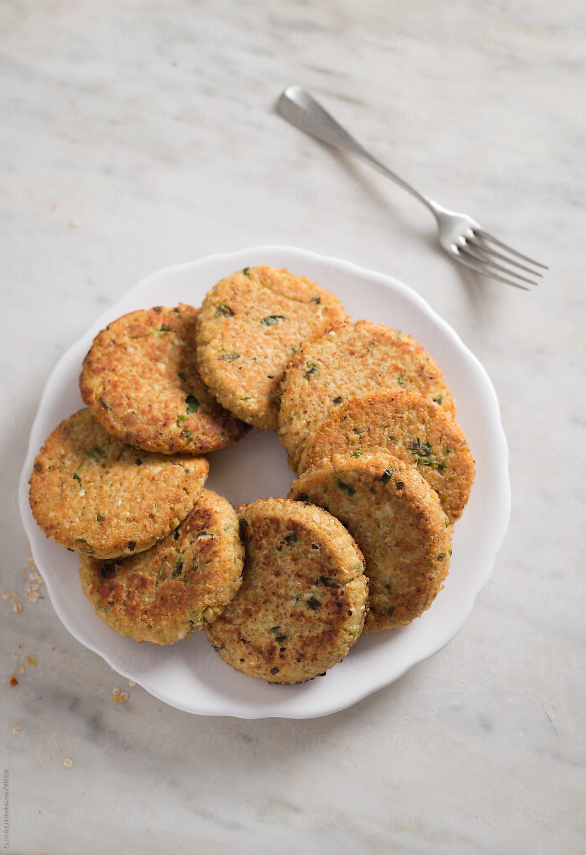 "Vegetarian Quinoa Burger" by Stocksy Contributor "Laura Adani" - Stocksy