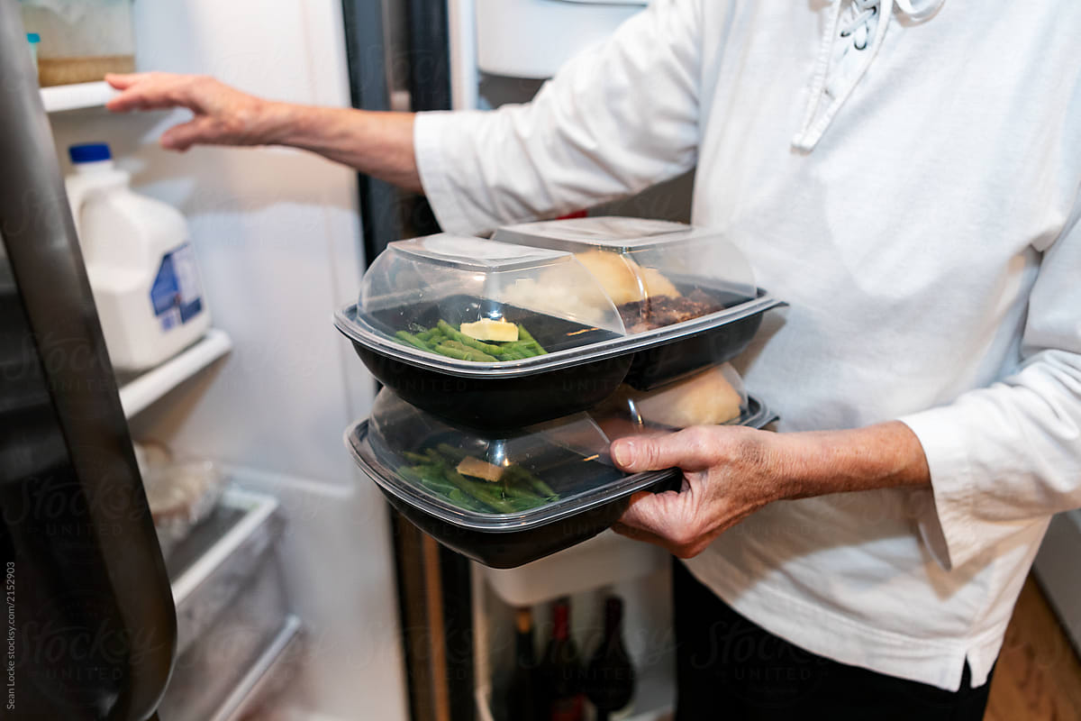 "Meal: Senior Puts Delivered Meals Into Refrigerator" by Stocksy ...
