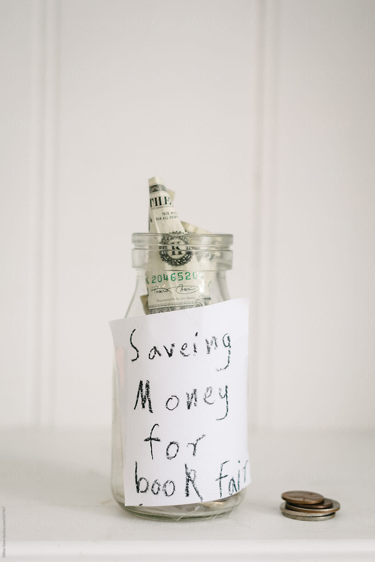 "Savings Money" by Stocksy Contributor "Gillian Vann" - Stocksy