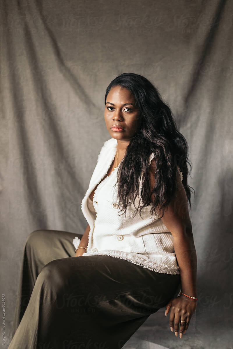 "Studio Portrait Of An Expressive Black Woman Staring At Camera" by ...