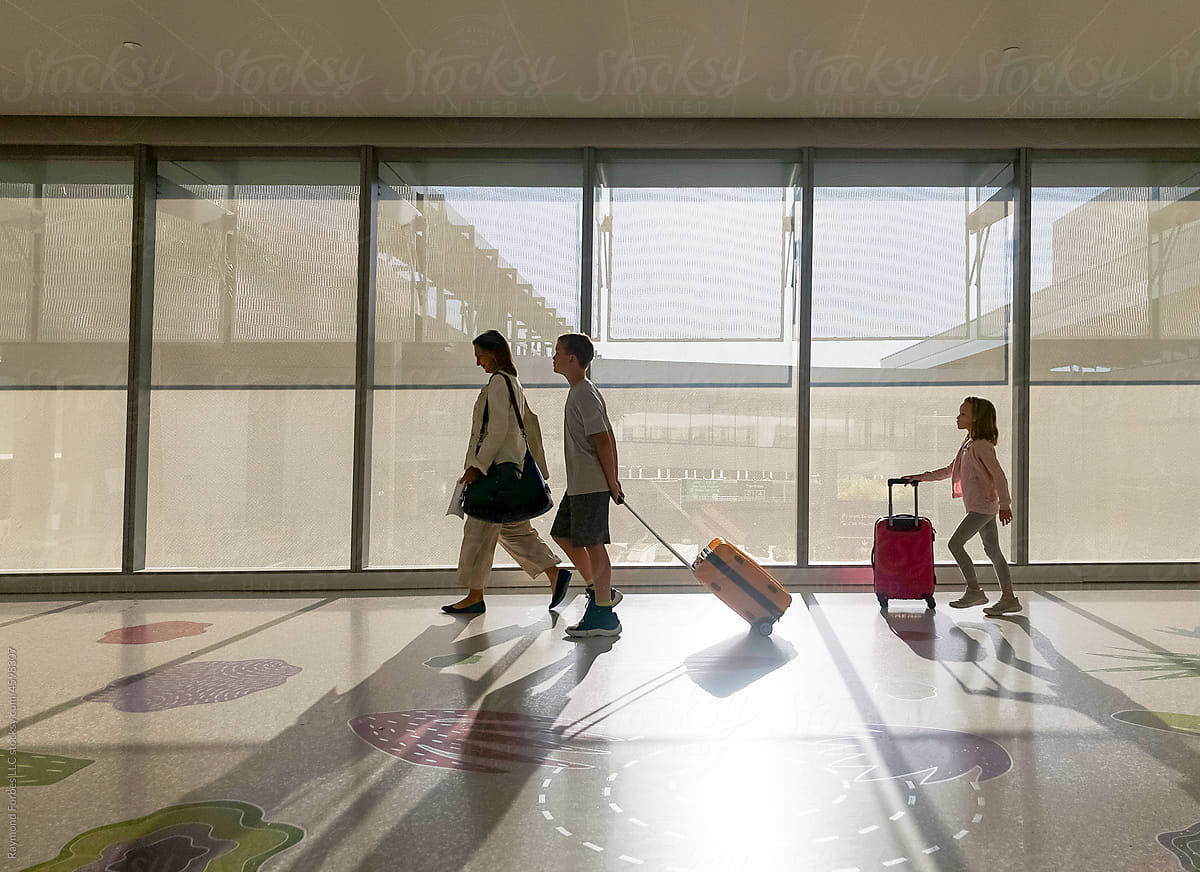 "Family UGC Travel Walking Together In Airport Luggage Terminal" by ...