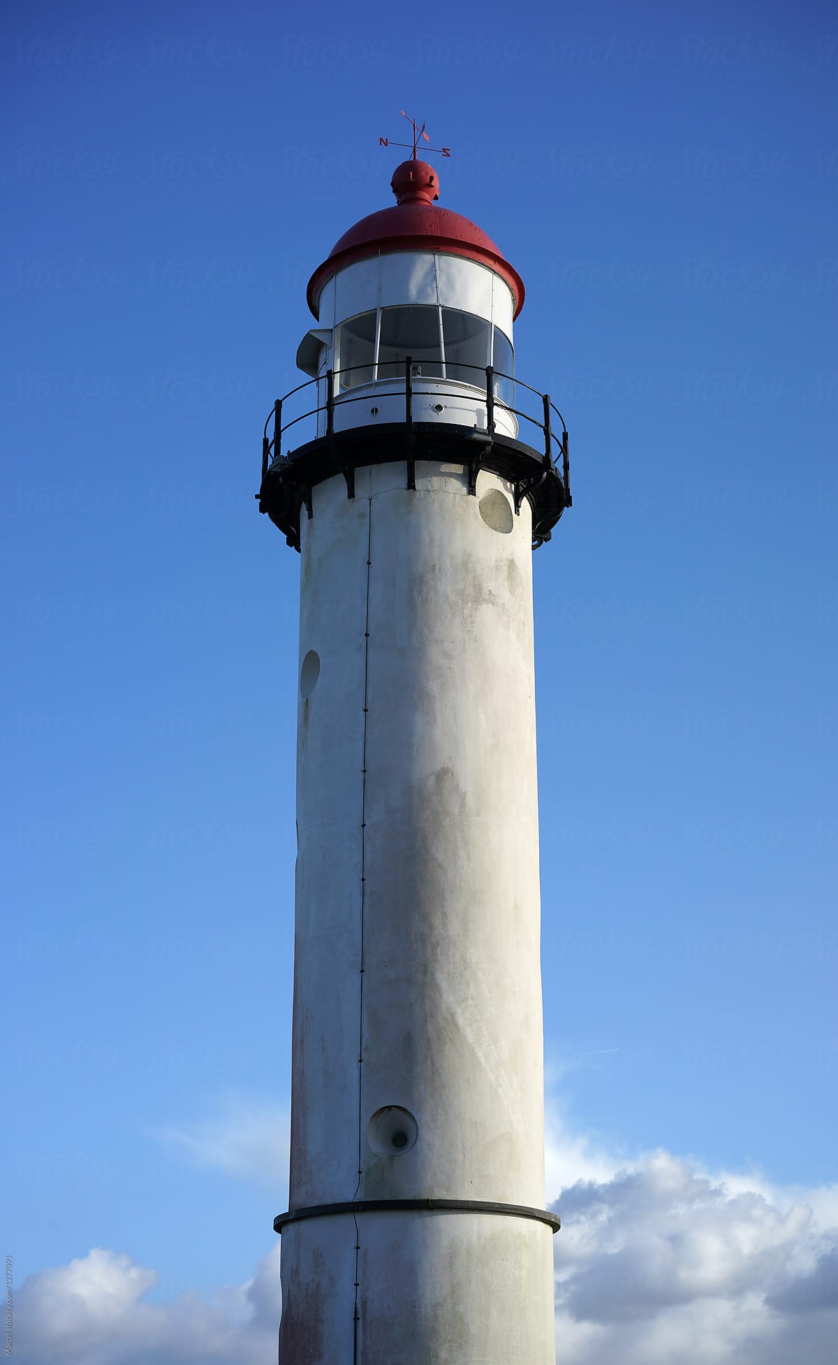 "Lighthouse With Red Roof" by Stocksy Contributor "Marcel" - Stocksy