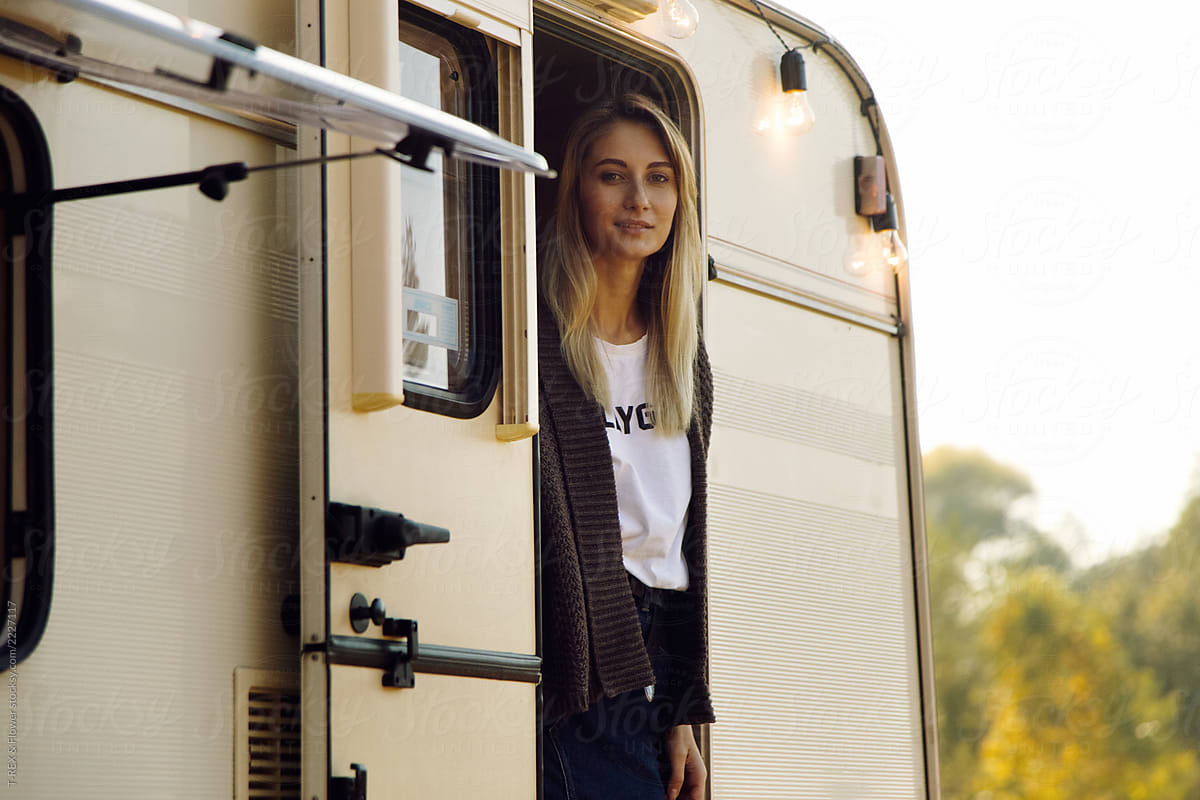 "Young Woman Standing In Doorway Of Caravan" by Stocksy Contributor ...