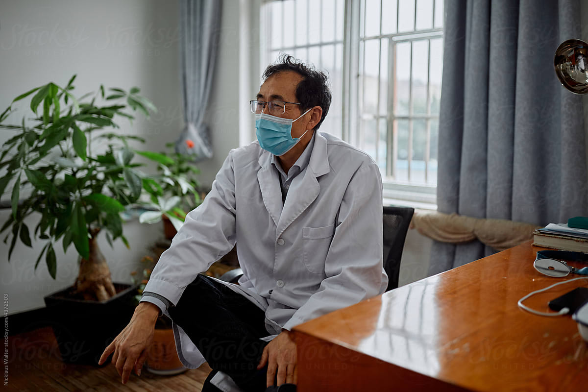 "Portrait Of A Chinese Doctor In His Hospital Office" by Stocksy ...