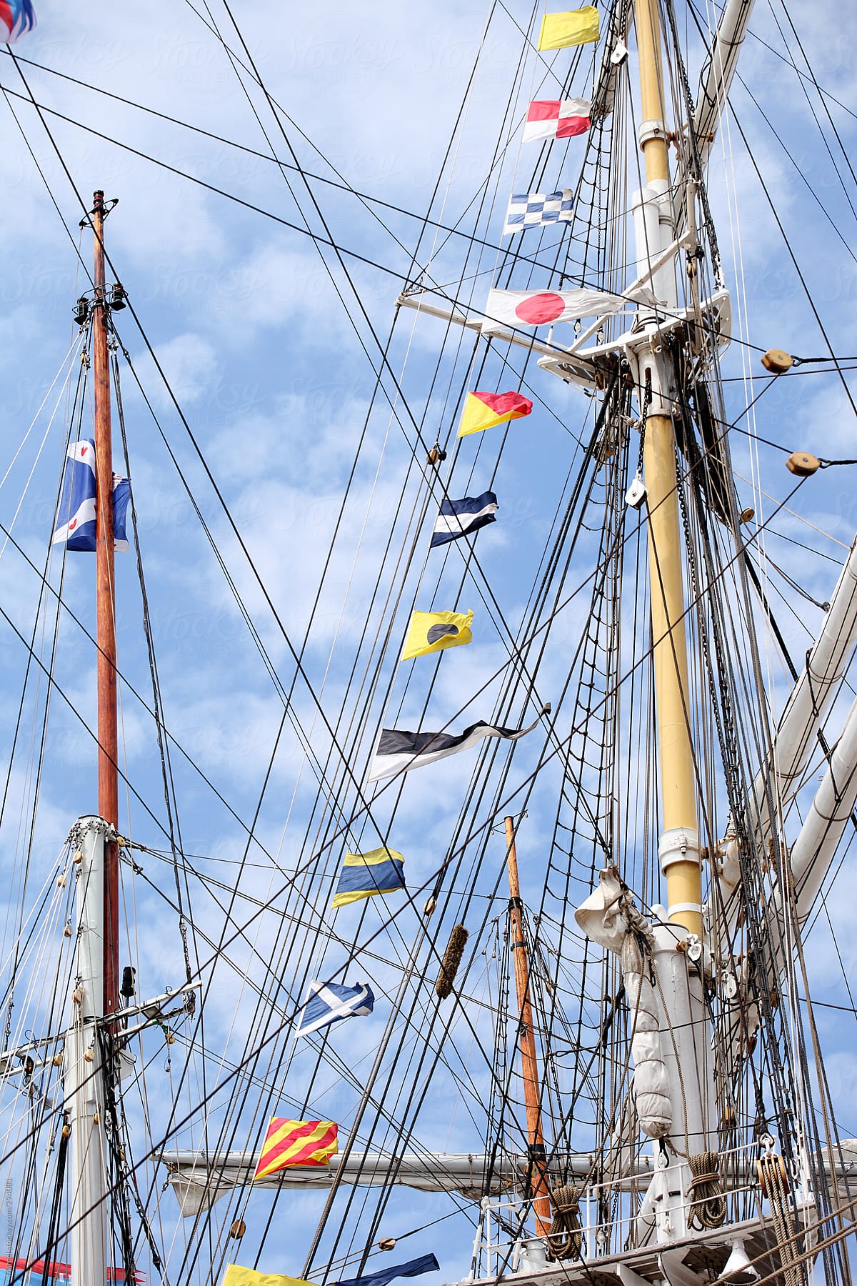 "Festive Flags On A Ship" by Stocksy Contributor "Marcel" - Stocksy