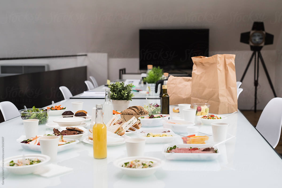 "Food In Office" by Stocksy Contributor "Garage Island Crew" - Stocksy