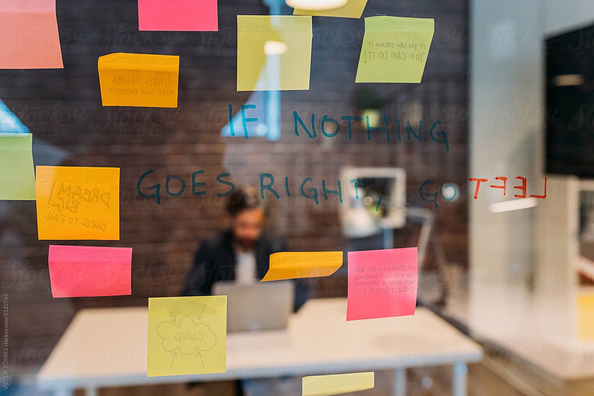 "Positive Message On Office Glass" by Stocksy Contributor "VICTOR ...