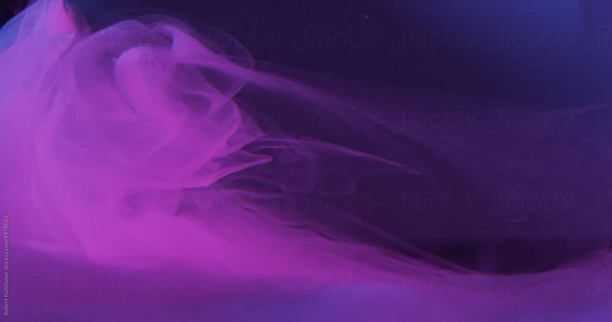 "Abstract Neon Pink Colored Clouds In Water" by Stocksy Contributor ...