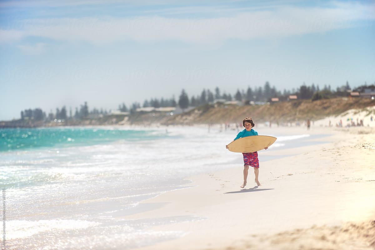 "Boy Running With A Skim Board At The Beach In Summer" by Stocksy ...