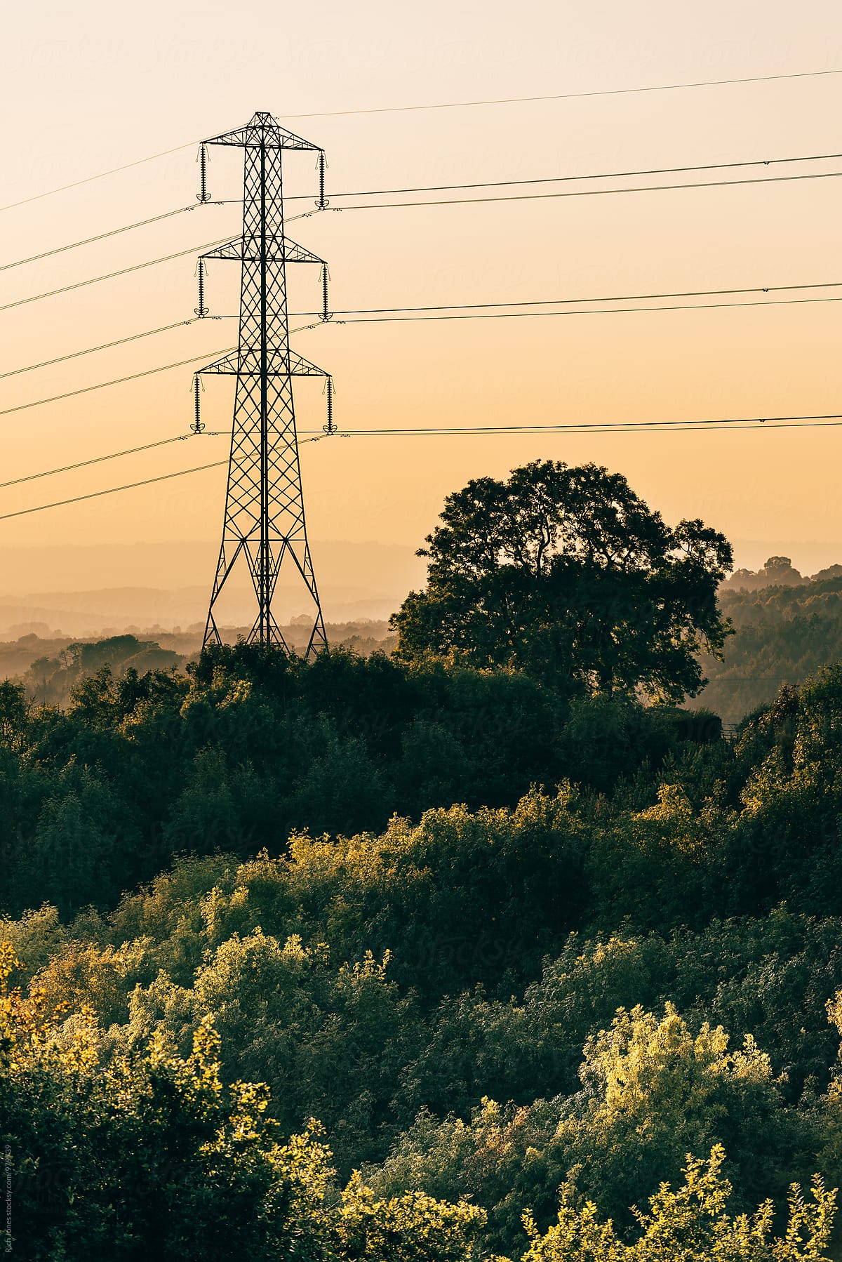 "Power Lines In Rural Land At Sunset" by Stocksy Contributor "Rich ...