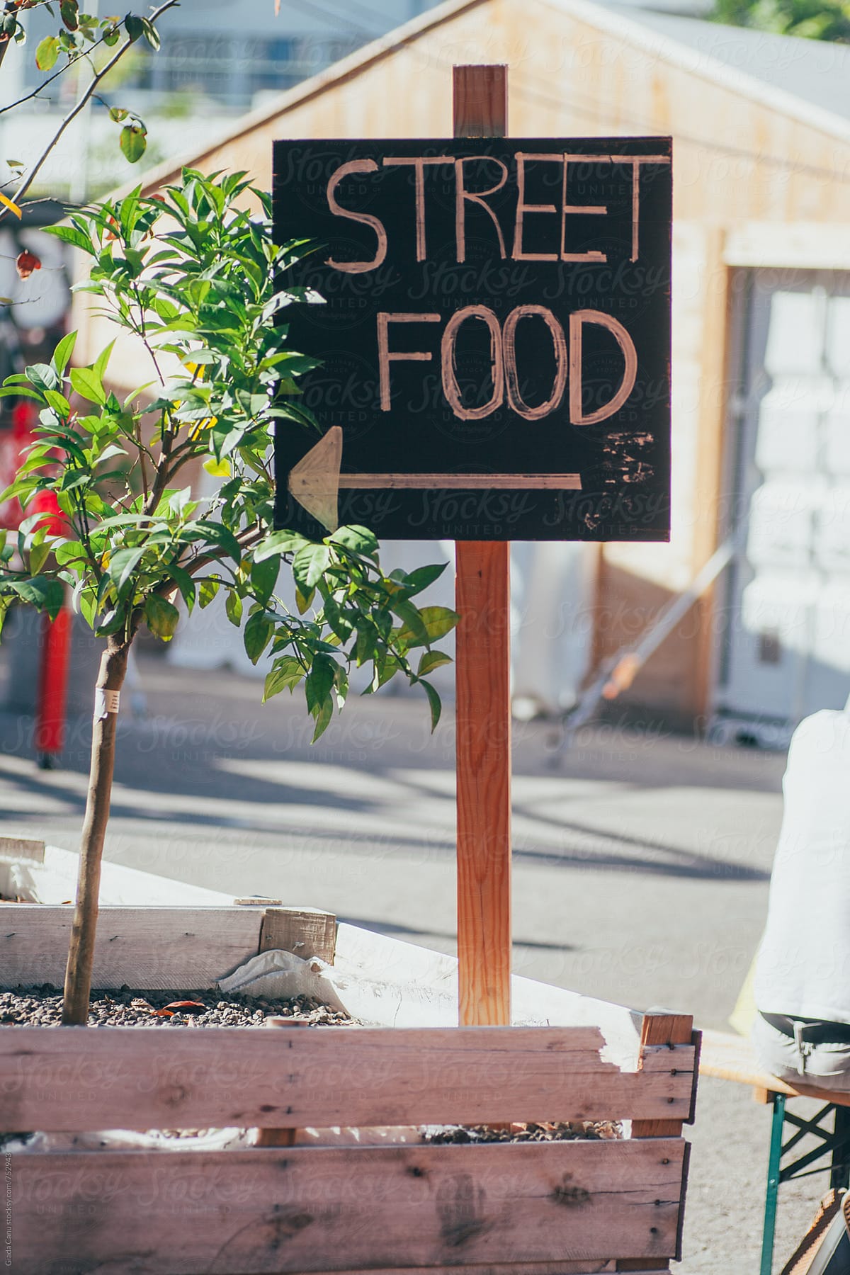 "Street Food Sign" by Stocksy Contributor "Giada Canu" - Stocksy