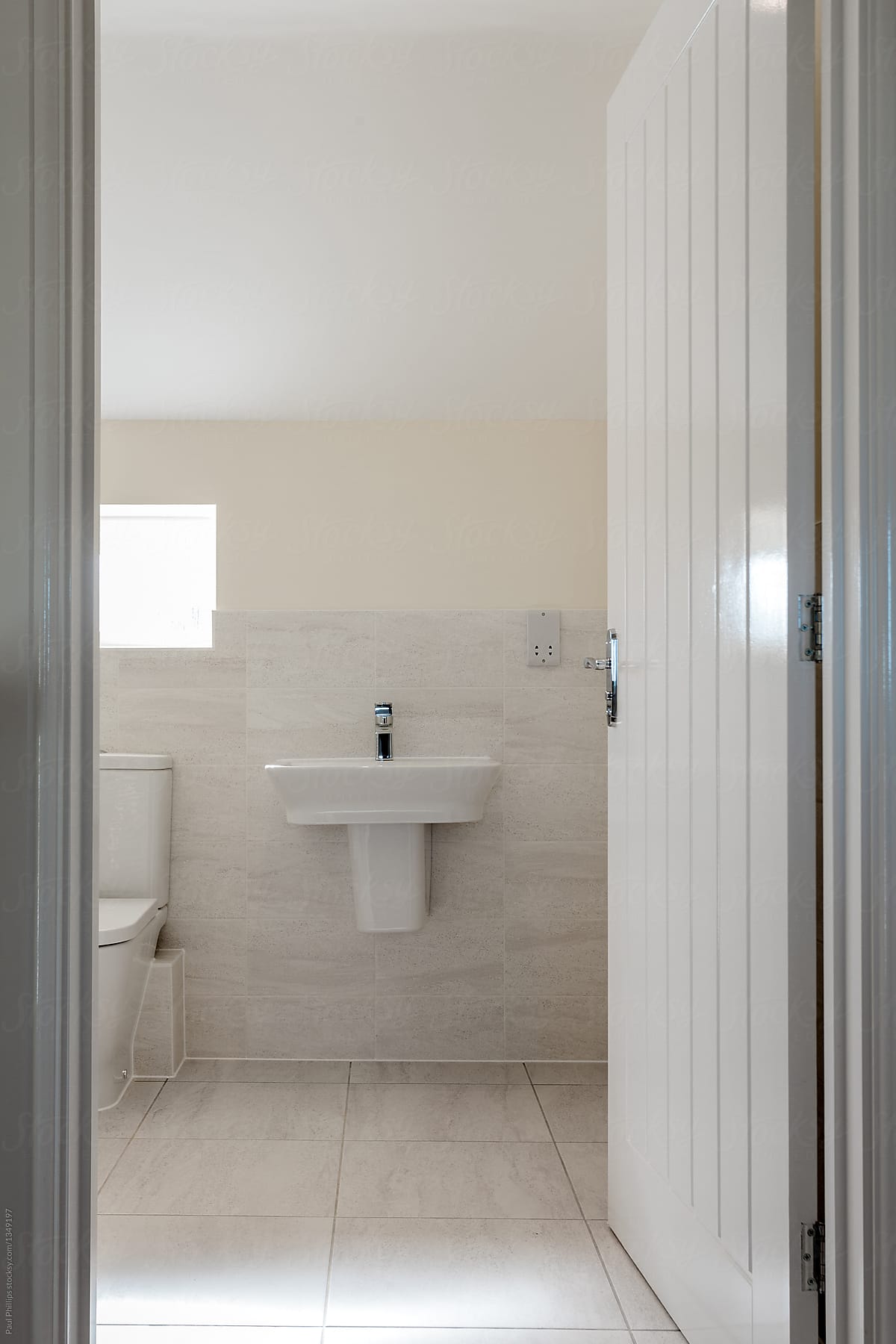 "Looking Through A Door To A Modern Bathroom." by Stocksy Contributor ...