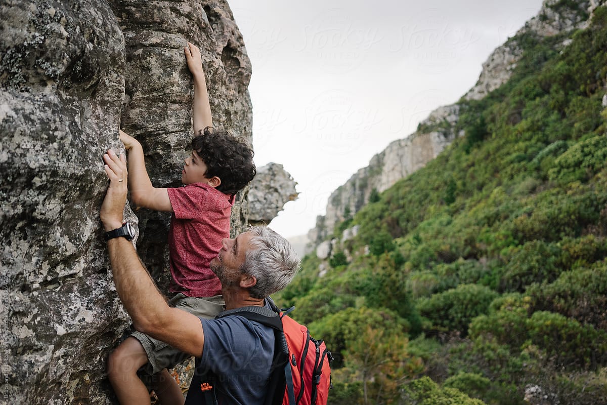 "Father And Son Rock Climbing" by Stocksy Contributor "Bruce And ...