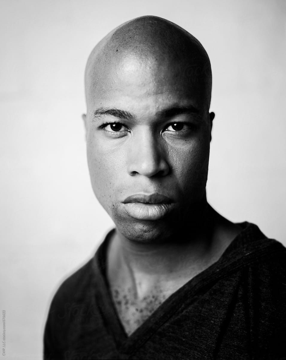 "African American Man Portrait" by Stocksy Contributor "CWP, LLC" - Stocksy