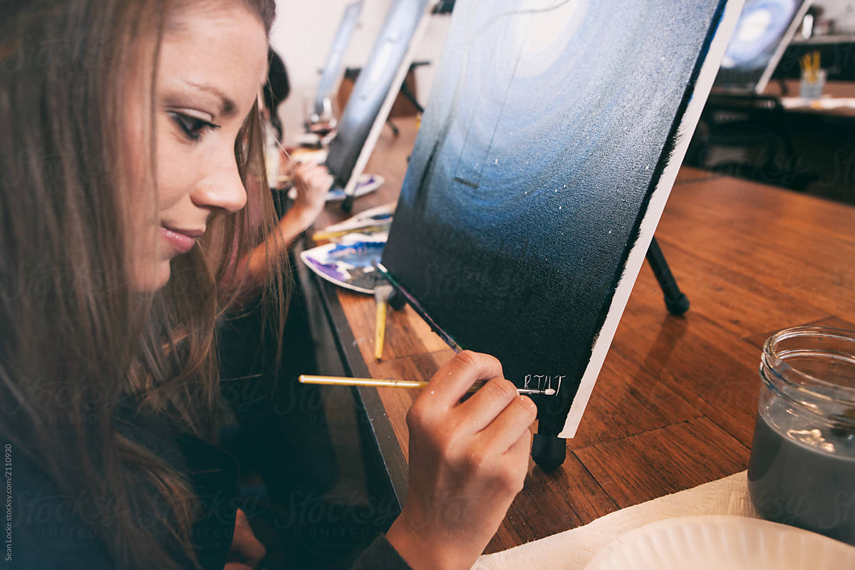 "Painting: Woman Signs Name To Artwork" by Stocksy Contributor "Sean ...