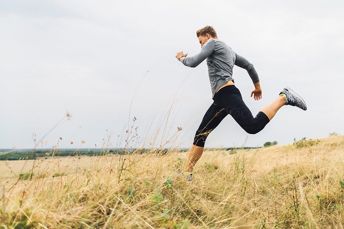 "Fit Man Running Outdoors" by Stocksy Contributor "Lumina" - Stocksy