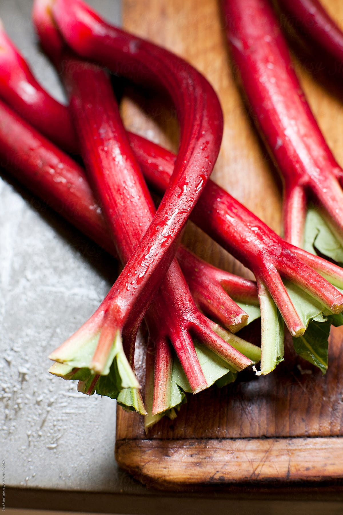 "Rhubarb Being Cut In Kitchen" by Stocksy Contributor "Sara Remington ...