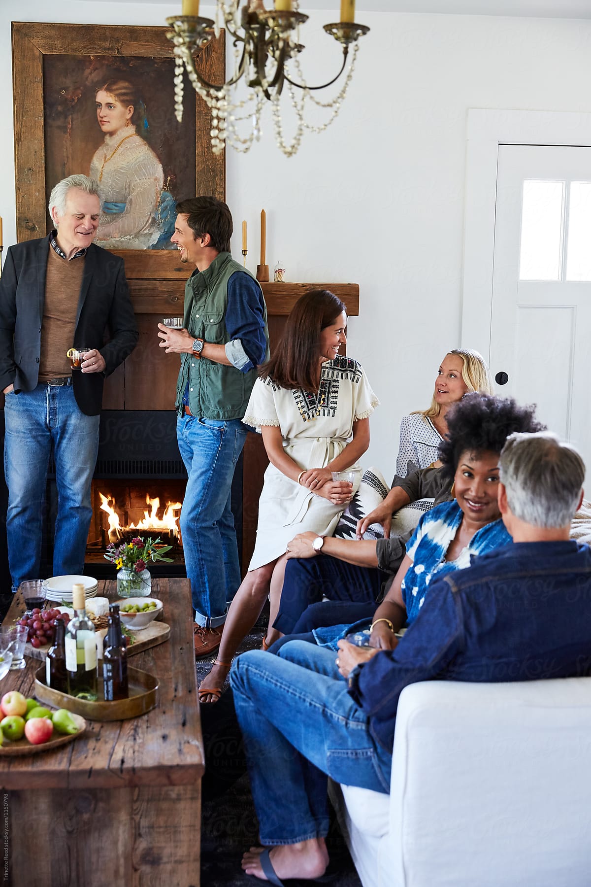 "Group Of Friends And Family Having A Cocktail Party In Their Home" by ...