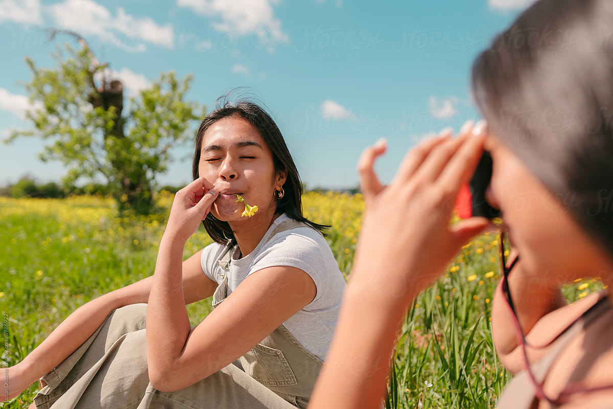 "Friends Taking Pictures Together" by Stocksy Contributor "Lucas Ottone ...