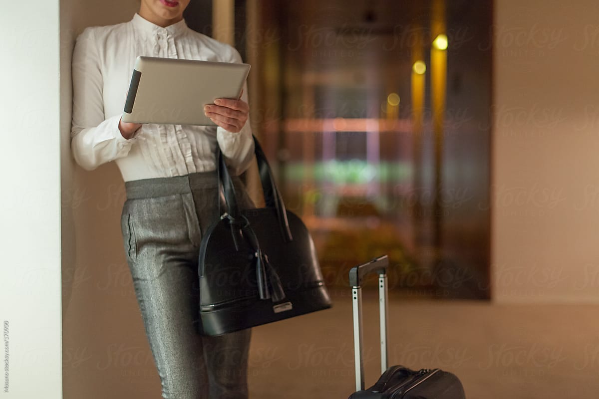 "Anonymous Woman Using Technology" by Stocksy Contributor "Mosuno ...