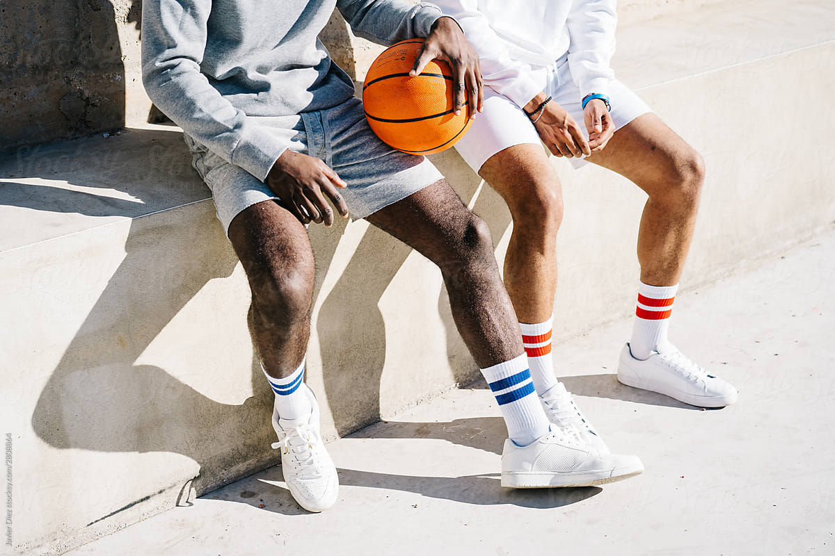"Basketball Players Resting After Training On Playground" by Stocksy ...