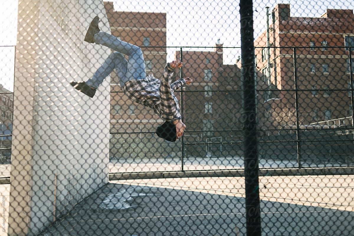 "Young Man Flipping In The Park" by Stocksy Contributor "koganami ...