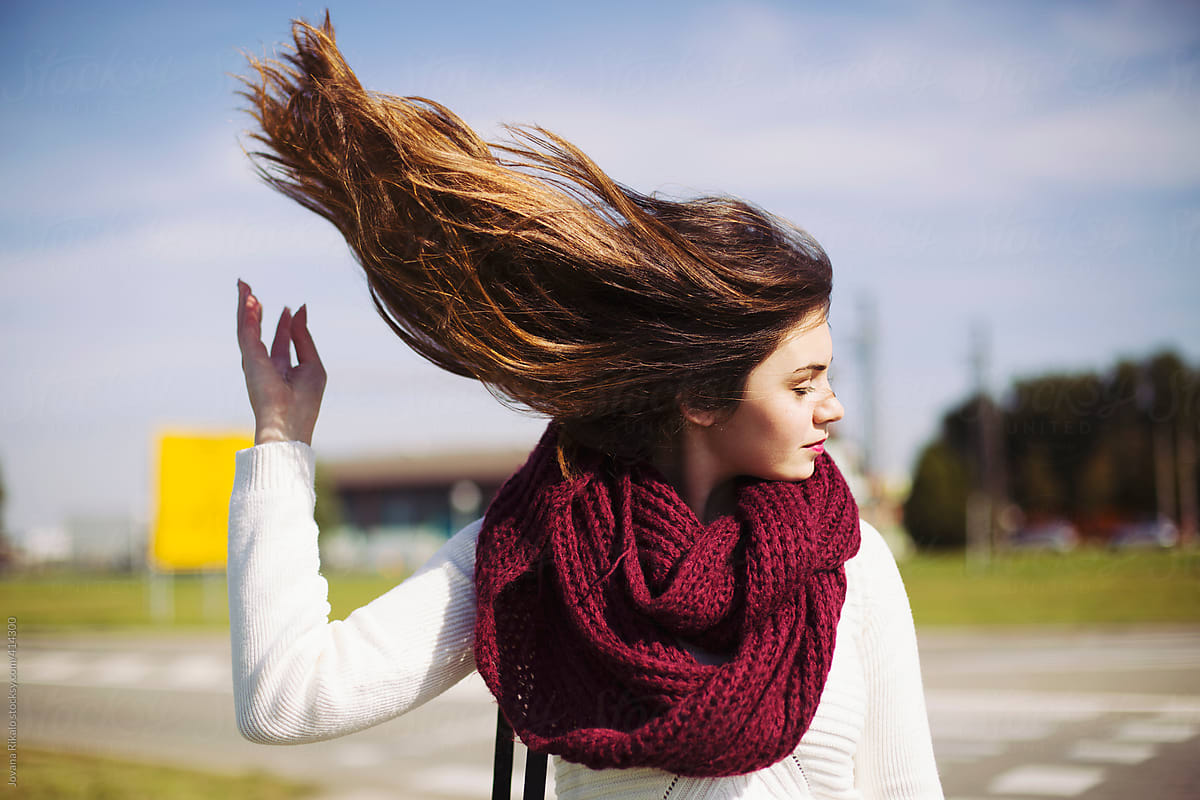 "Young Woman With Her Hair Flying Off To One Side" by Stocksy ...